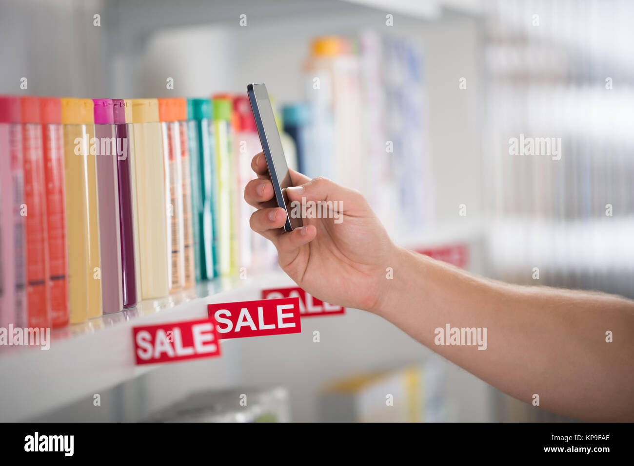 Customer Photographing Cosmetic Product Stock Photo - Alamy
