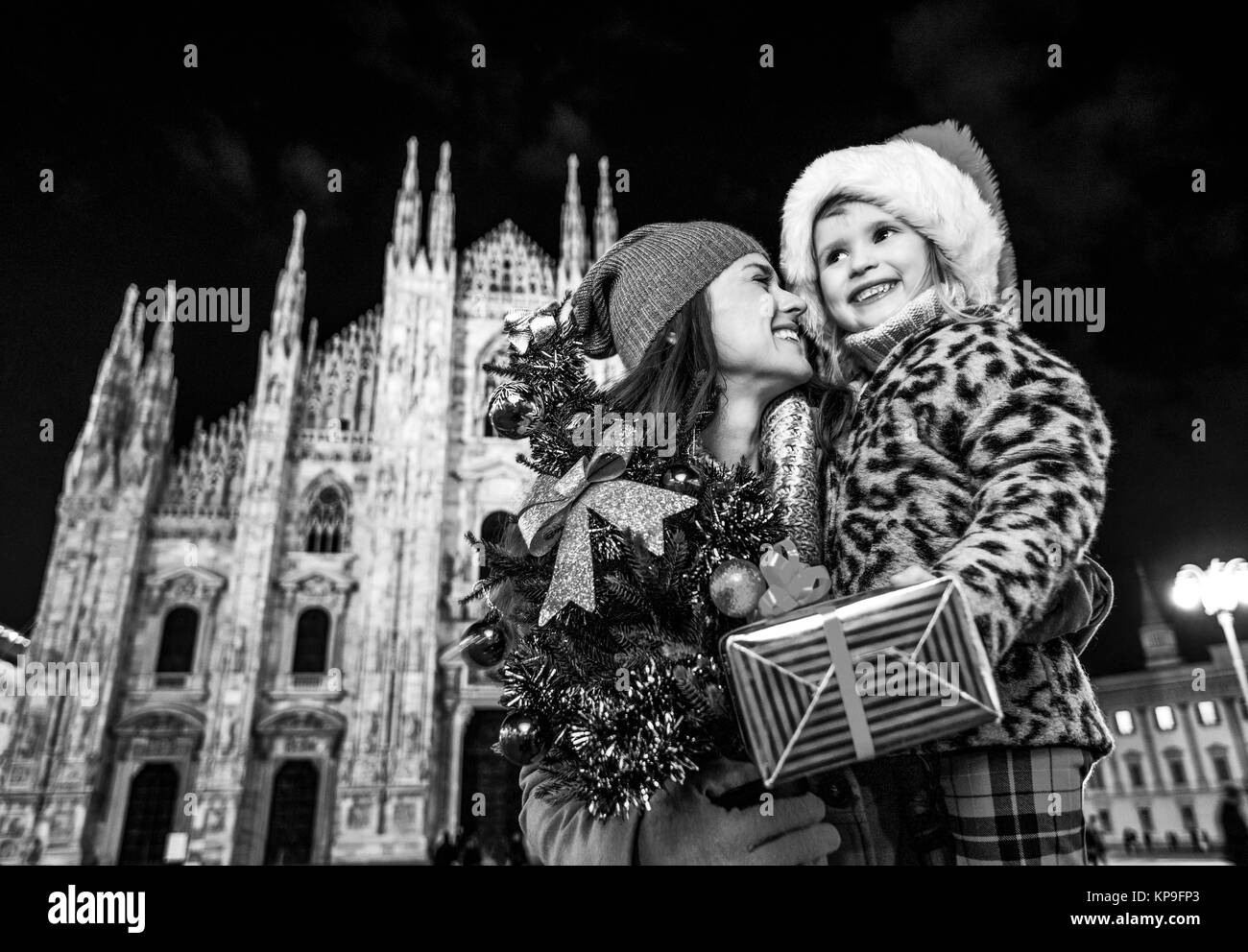 Fun Christmas family trip to Milan, Italy. Portrait of smiling modern ...