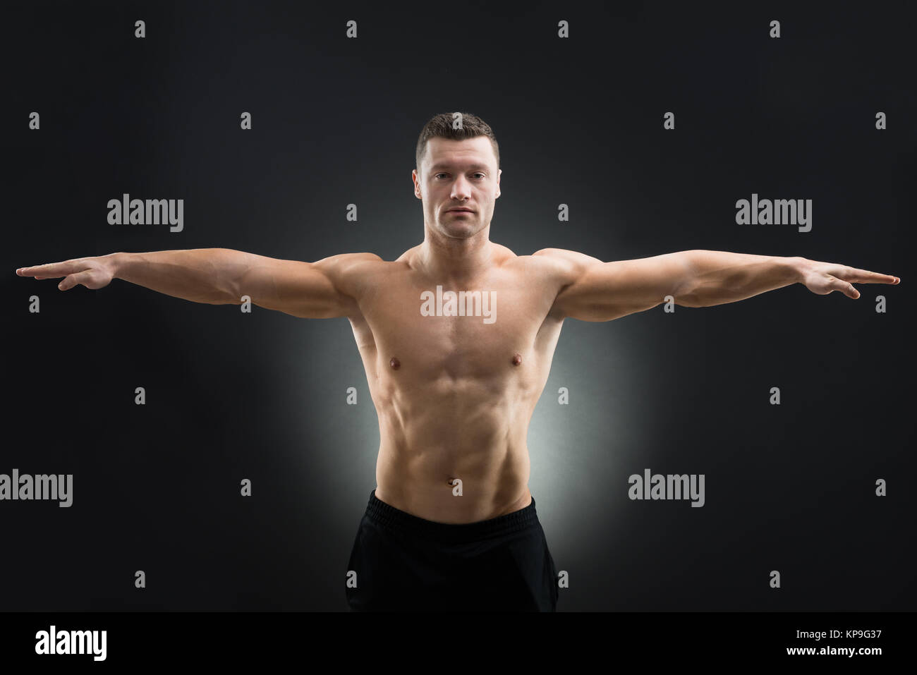 Muscular black man outstretched hi-res stock photography and images - Alamy