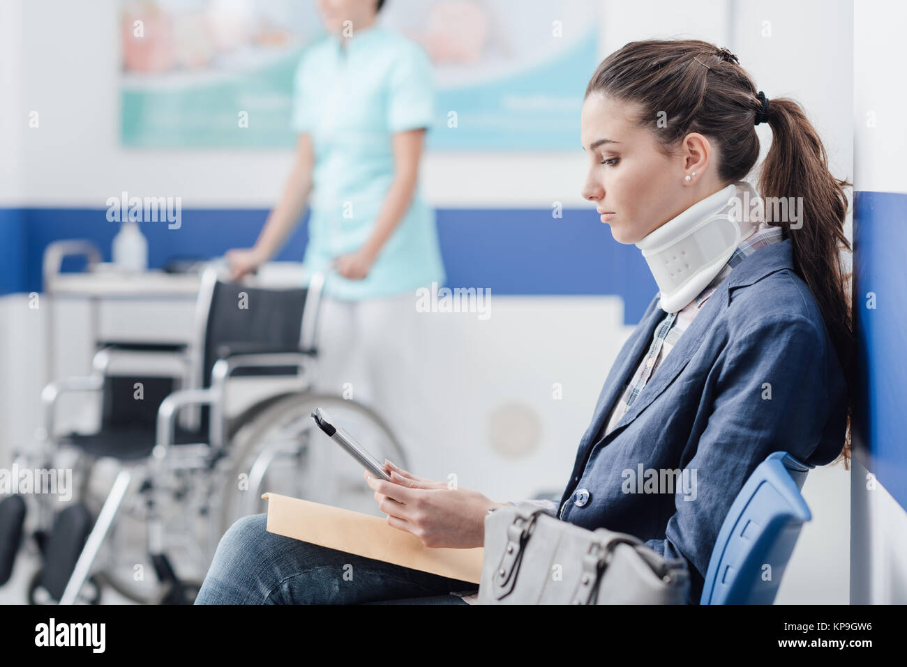 Young female patient with cervical collar support at the hospital, she ...