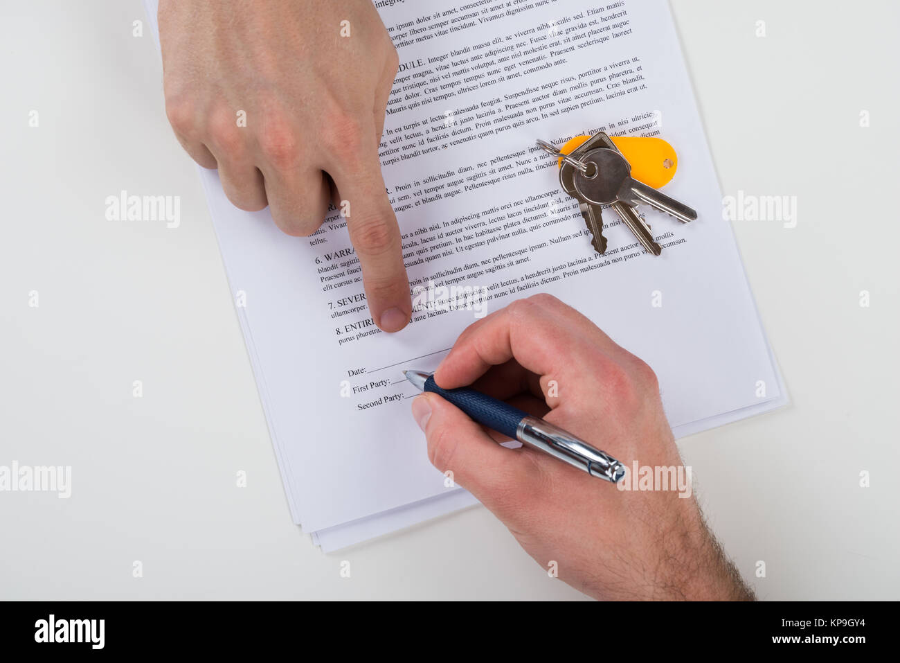 Real Estate Agent Assisting Client To Sign Contract Paper Stock Photo ...