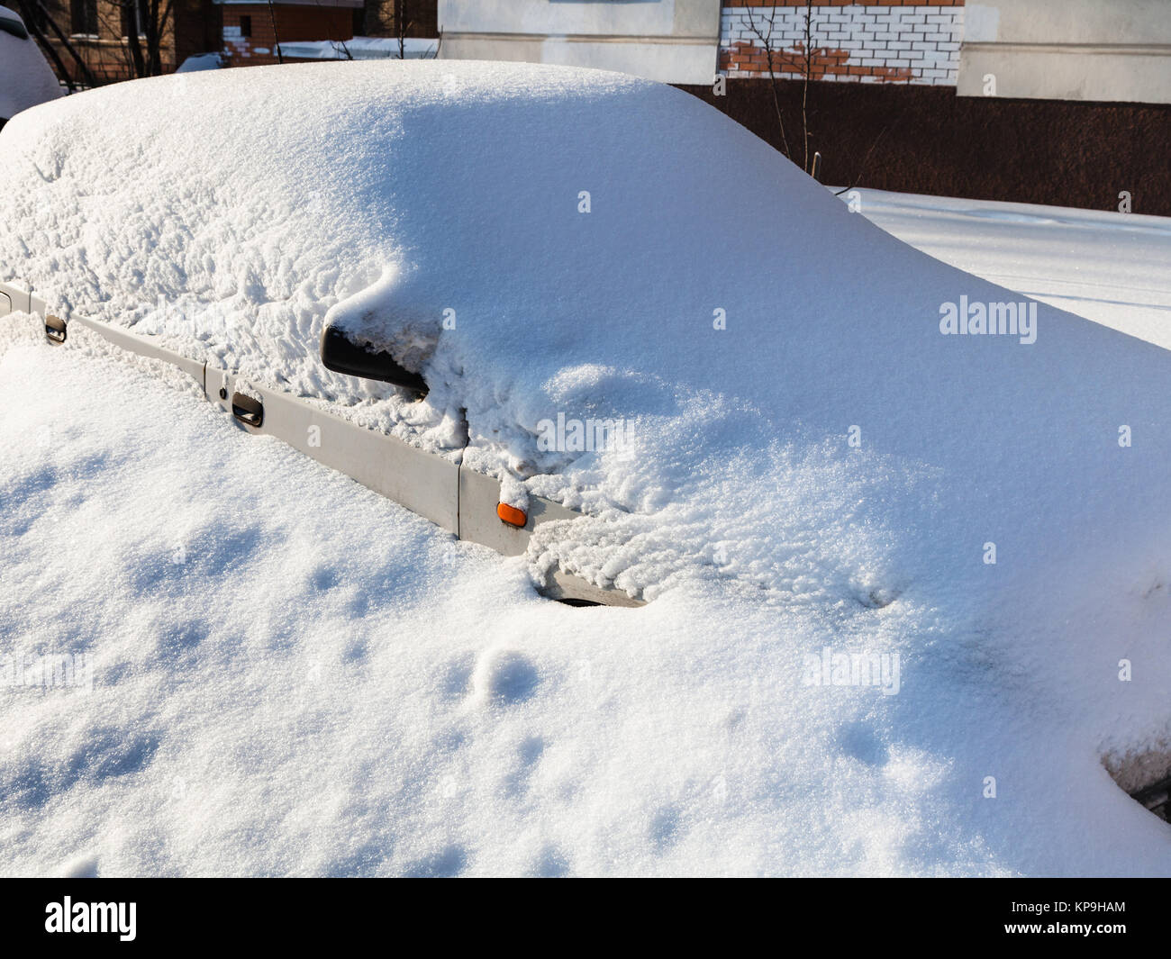 white car under snowdrift in parking lot Stock Photo - Alamy
