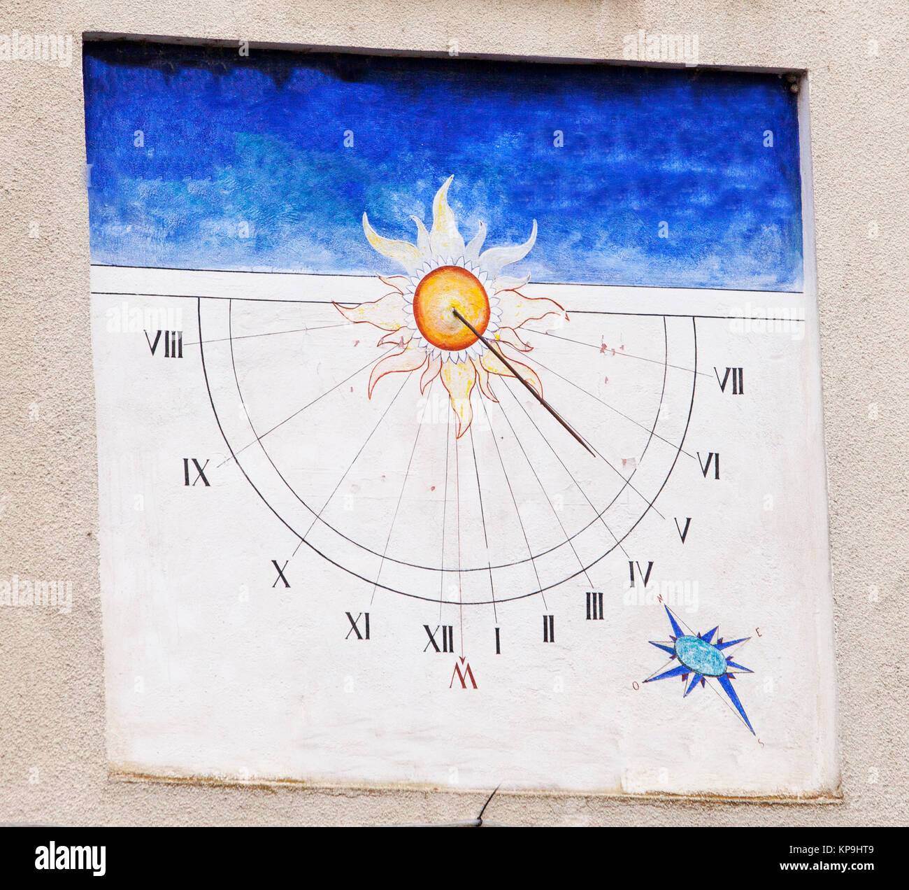 Sundial on a wall Stock Photo - Alamy