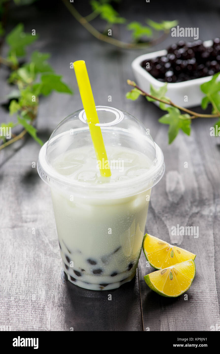 Lemon Boba Bubble Tea with fruits and crushed ice Stock Photo - Alamy