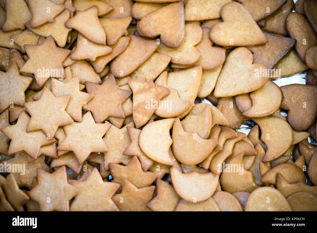 Christmas homemade gingerbread stars, bells, hearts cookies Stock Photo ...