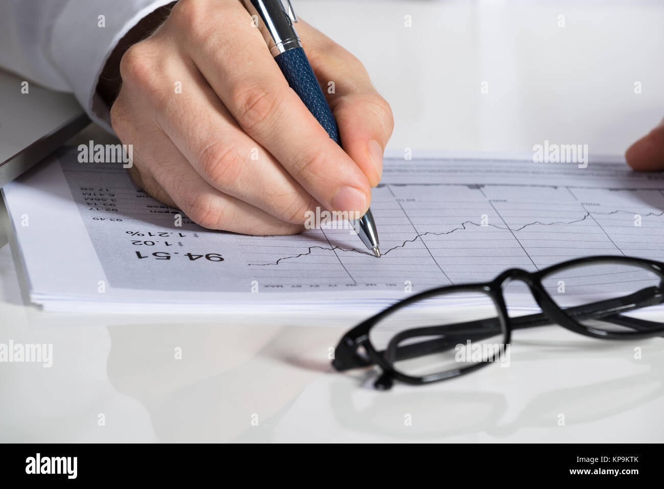 Businessman Preparing Financial Chart At Desk Stock Photo - Alamy