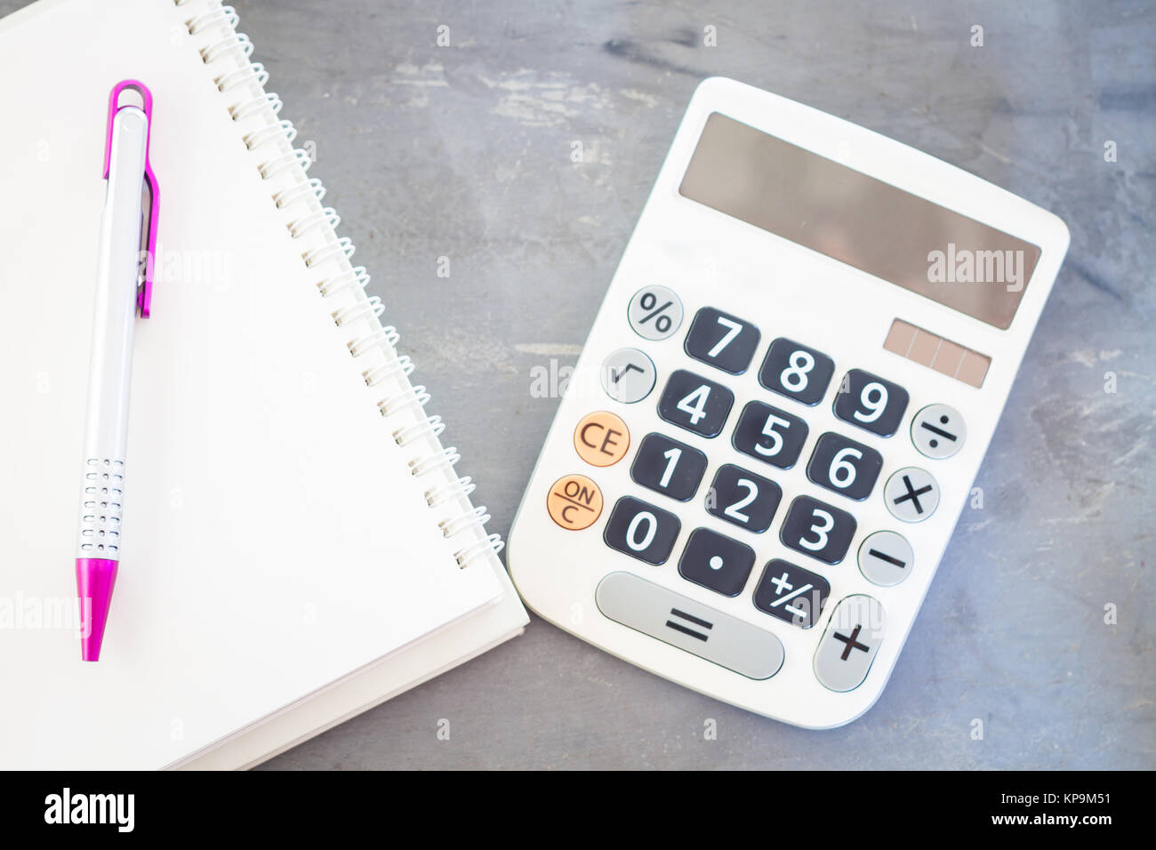 Calculator, notepad and pen on grey background Stock Photo - Alamy Calculator, notepad and pen on grey background Stock Photo - Alamy