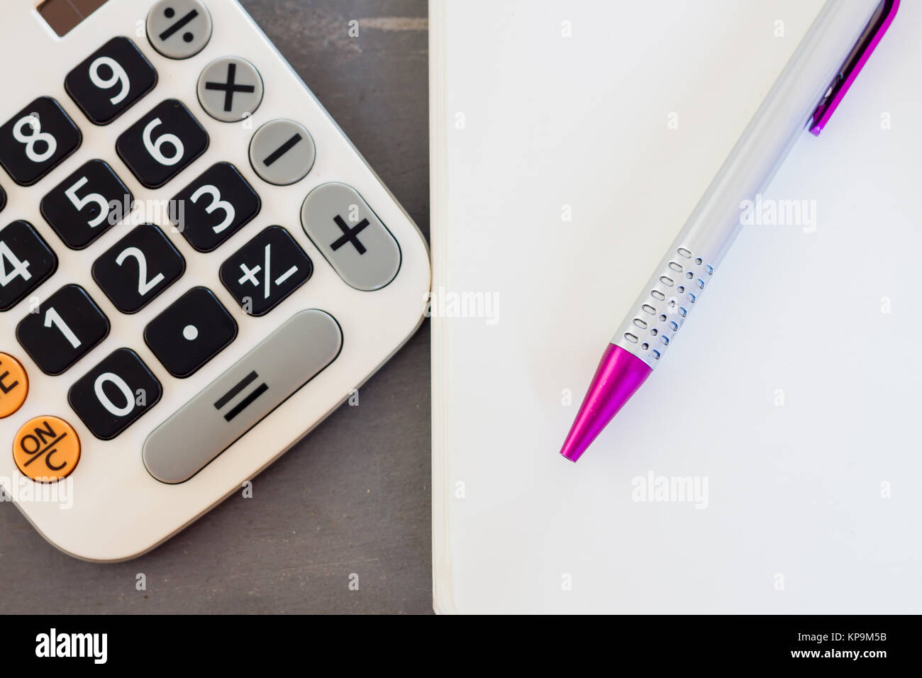 Calculator, notepad and pen on grey background Stock Photo - Alamy Calculator, notepad and pen on grey background Stock Photo - Alamy
