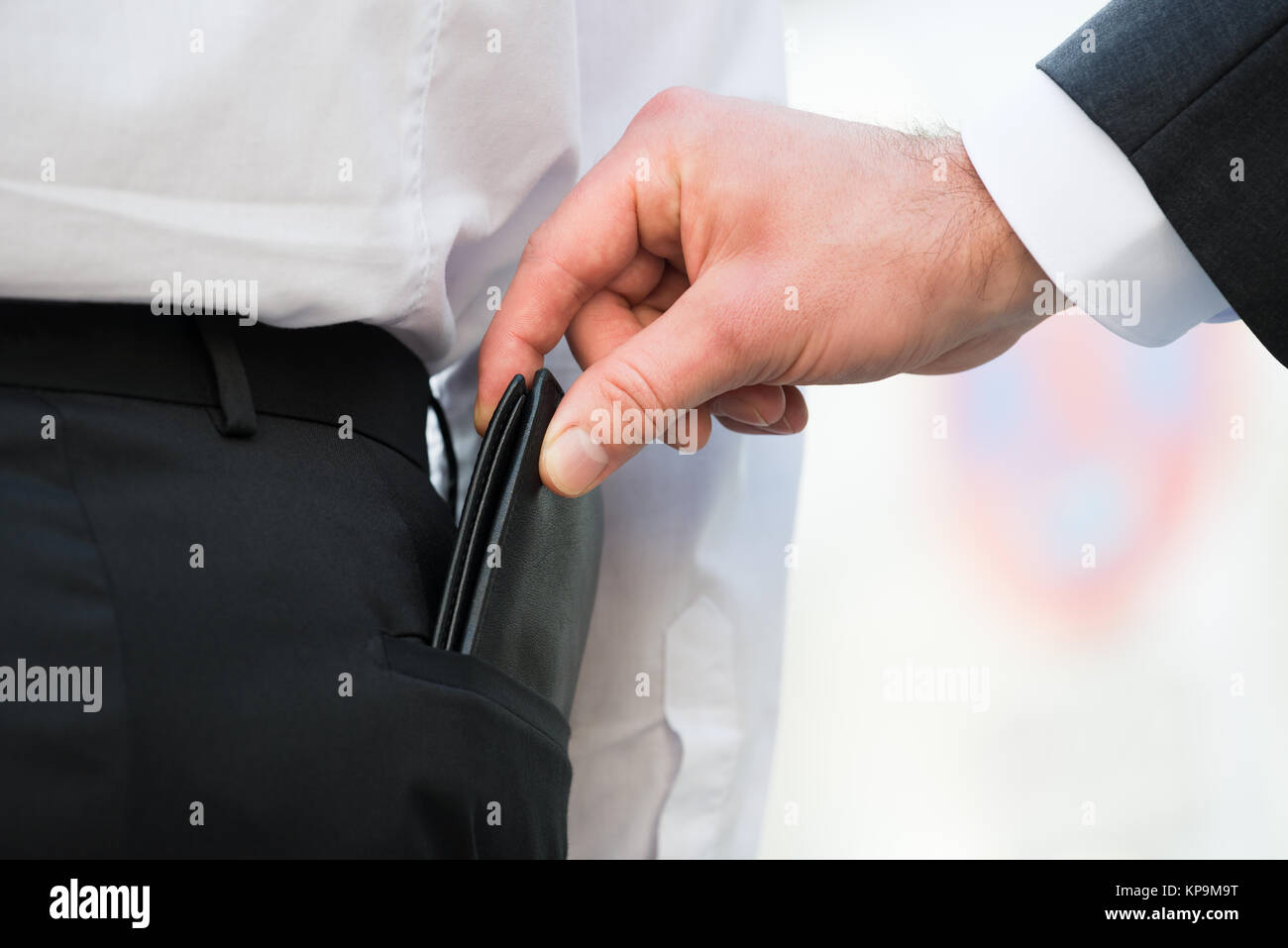 Hand pickpocketing hi-res stock photography and images - Alamy