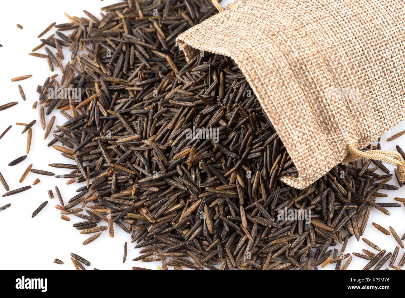 Heap of wild rice on white background Stock Photo - Alamy