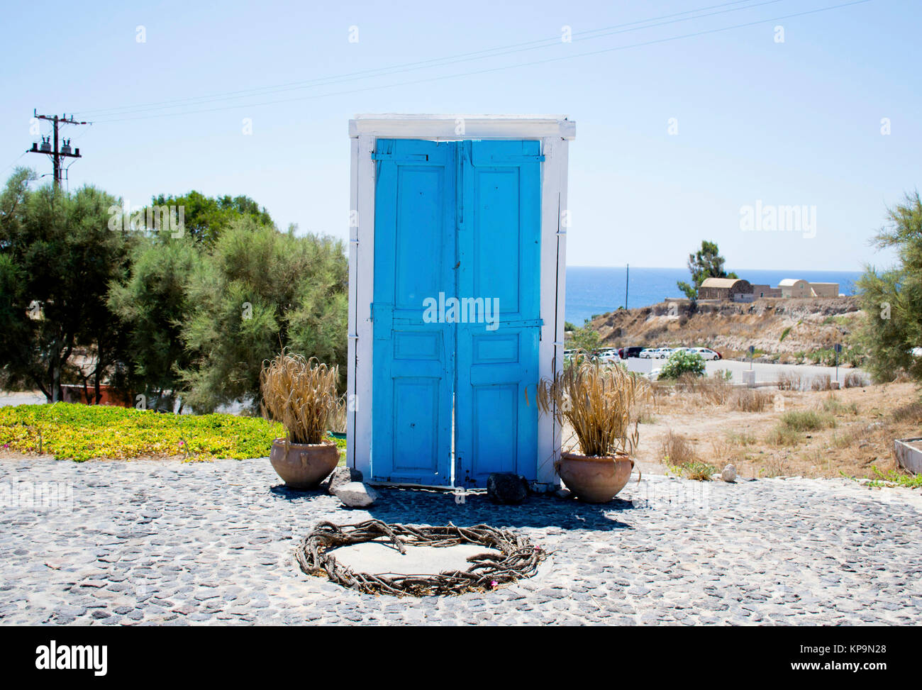 exterior door ajar - blue and white Stock Photo - Alamy
