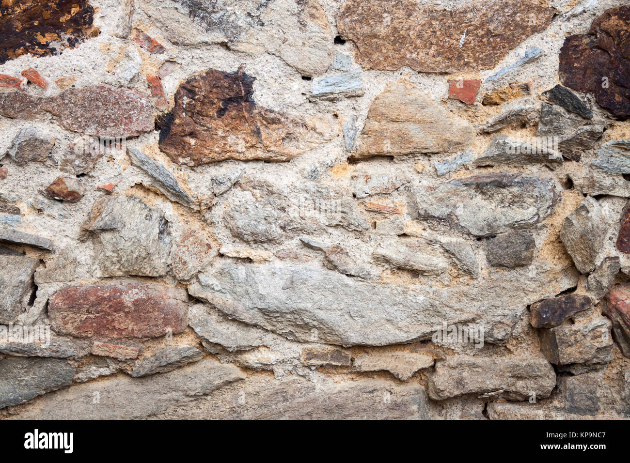 old buildings - stone walls with very different sized stones Stock ...