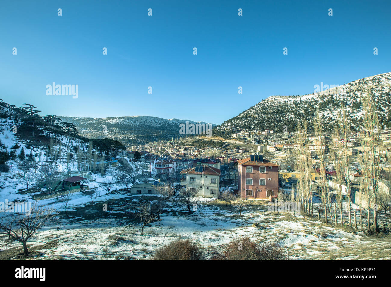View of snow covered houses at Sertavul mountain pass in a snow cold ...