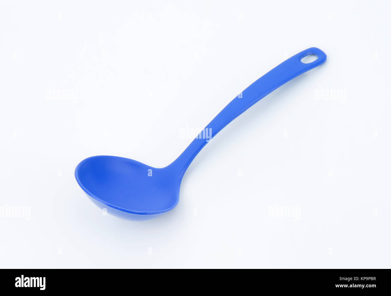 Blue plastic ladle Stock Photo - Alamy