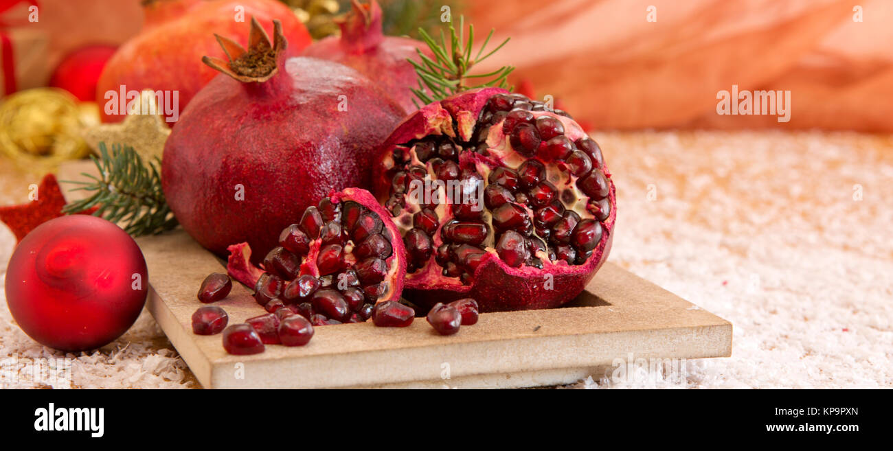 Juicy pomegranate fruit over wooden vintage table.Fresh ripe ...