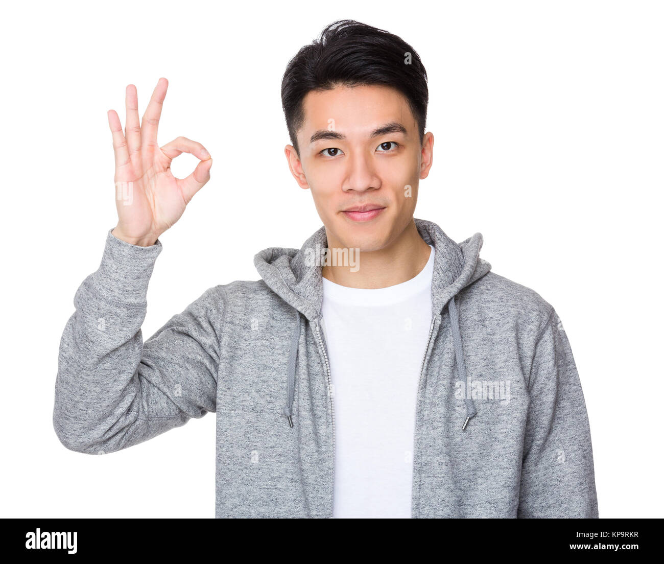 Man with ok sign gesture Stock Photo - Alamy