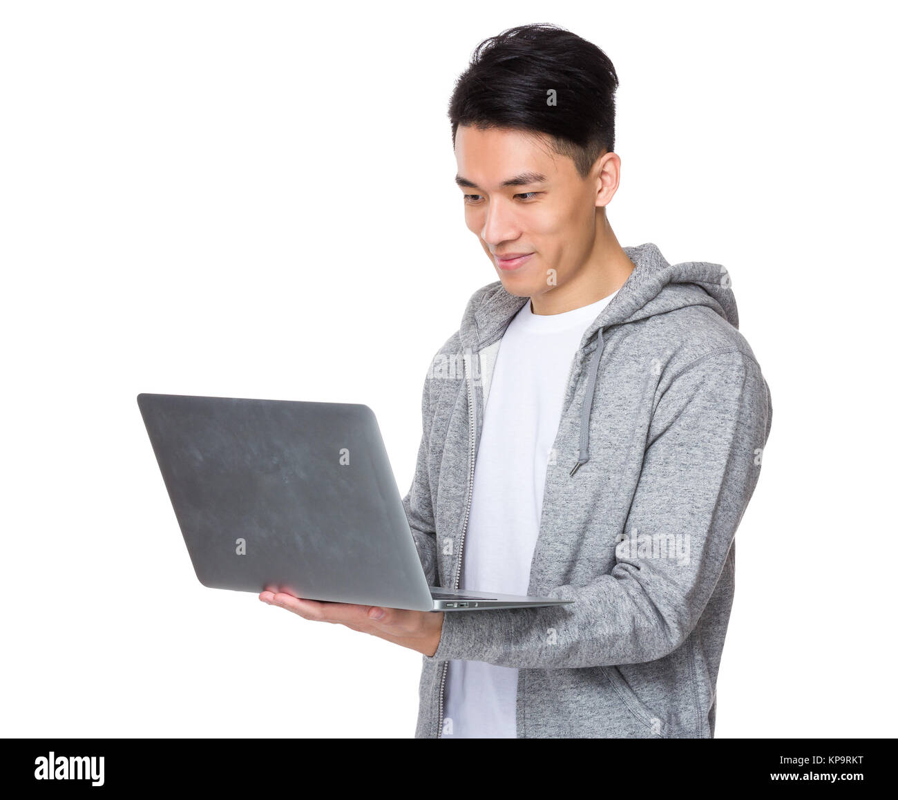 Asian man use of laptop computer Stock Photo - Alamy