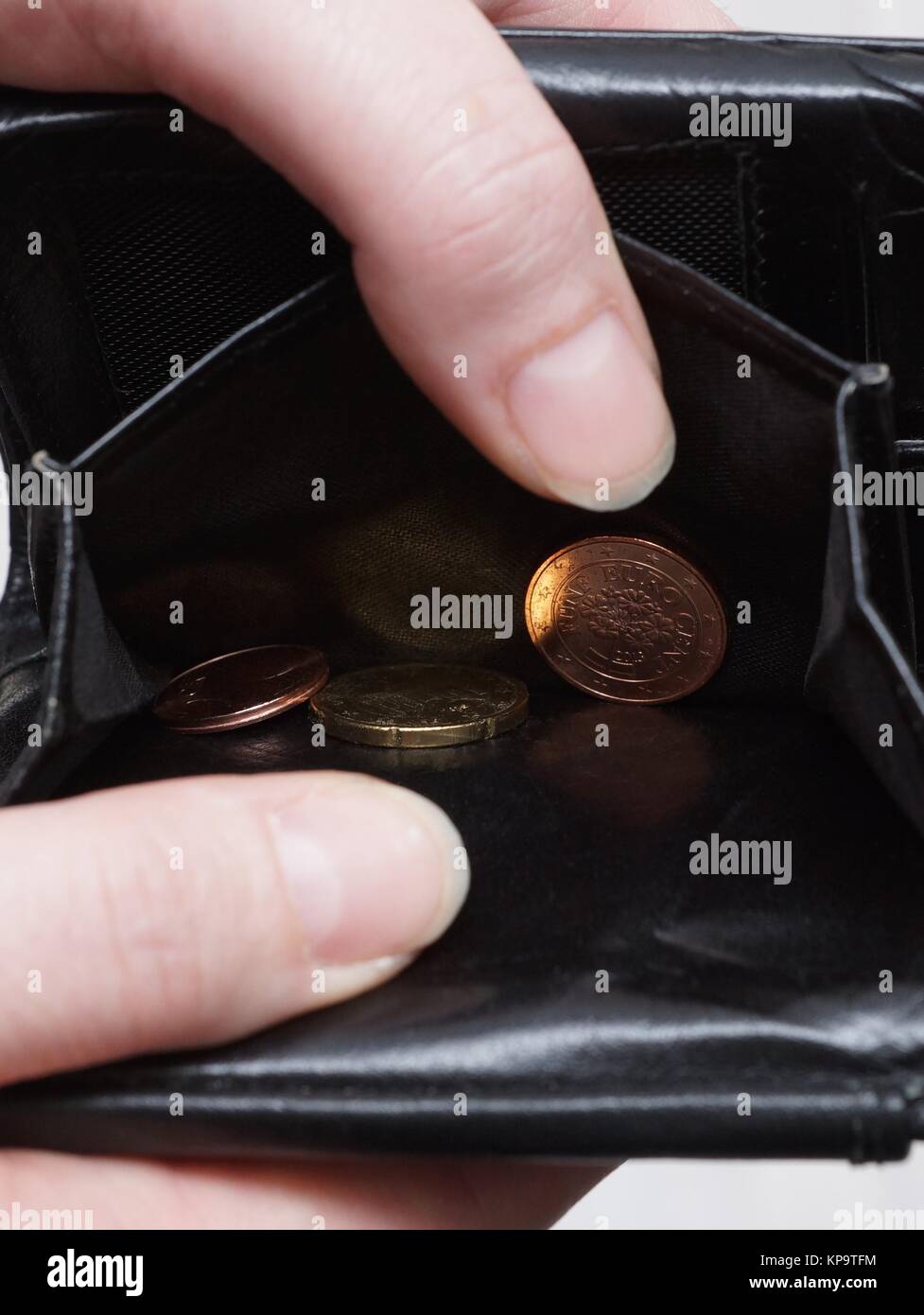 loose change in your wallet Stock Photo - Alamy