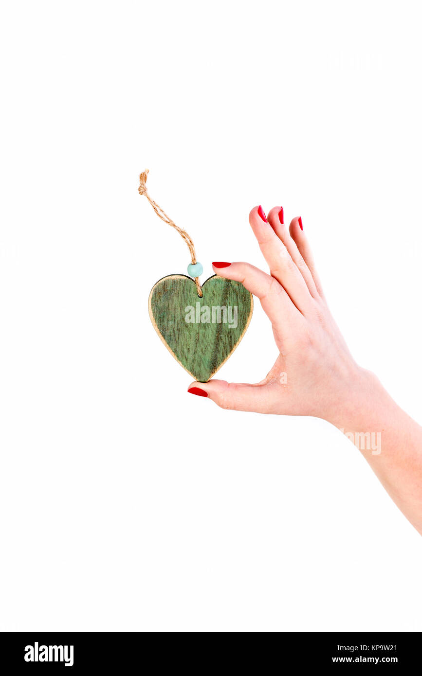 Female Hand Holding Green Heart Stock Photo - Alamy