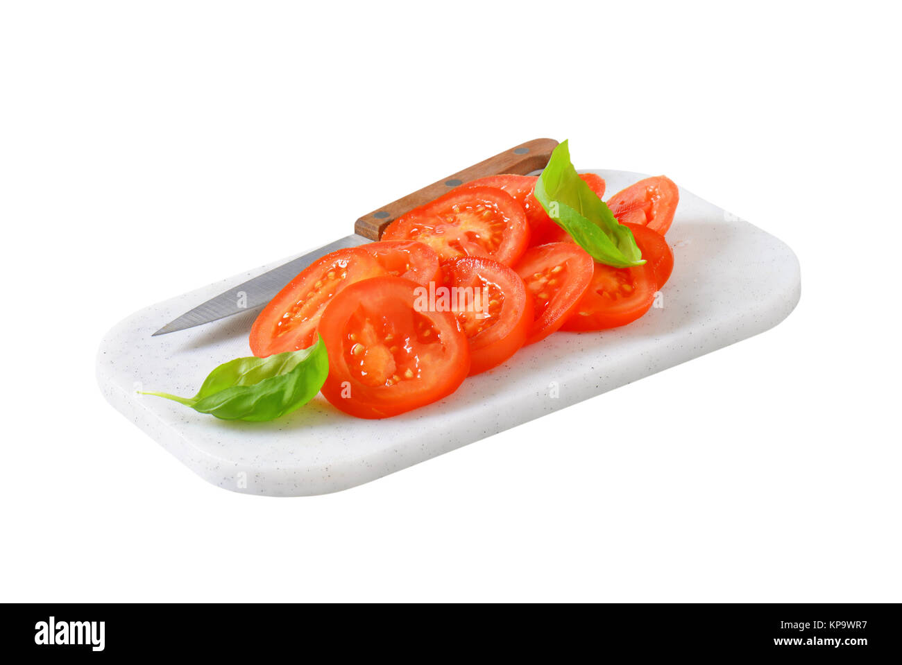 Ripe red tomato sliced Cut Out Stock Images & Pictures - Alamy