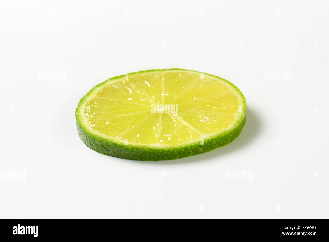 Fresh lime fruit slice Stock Photo - Alamy