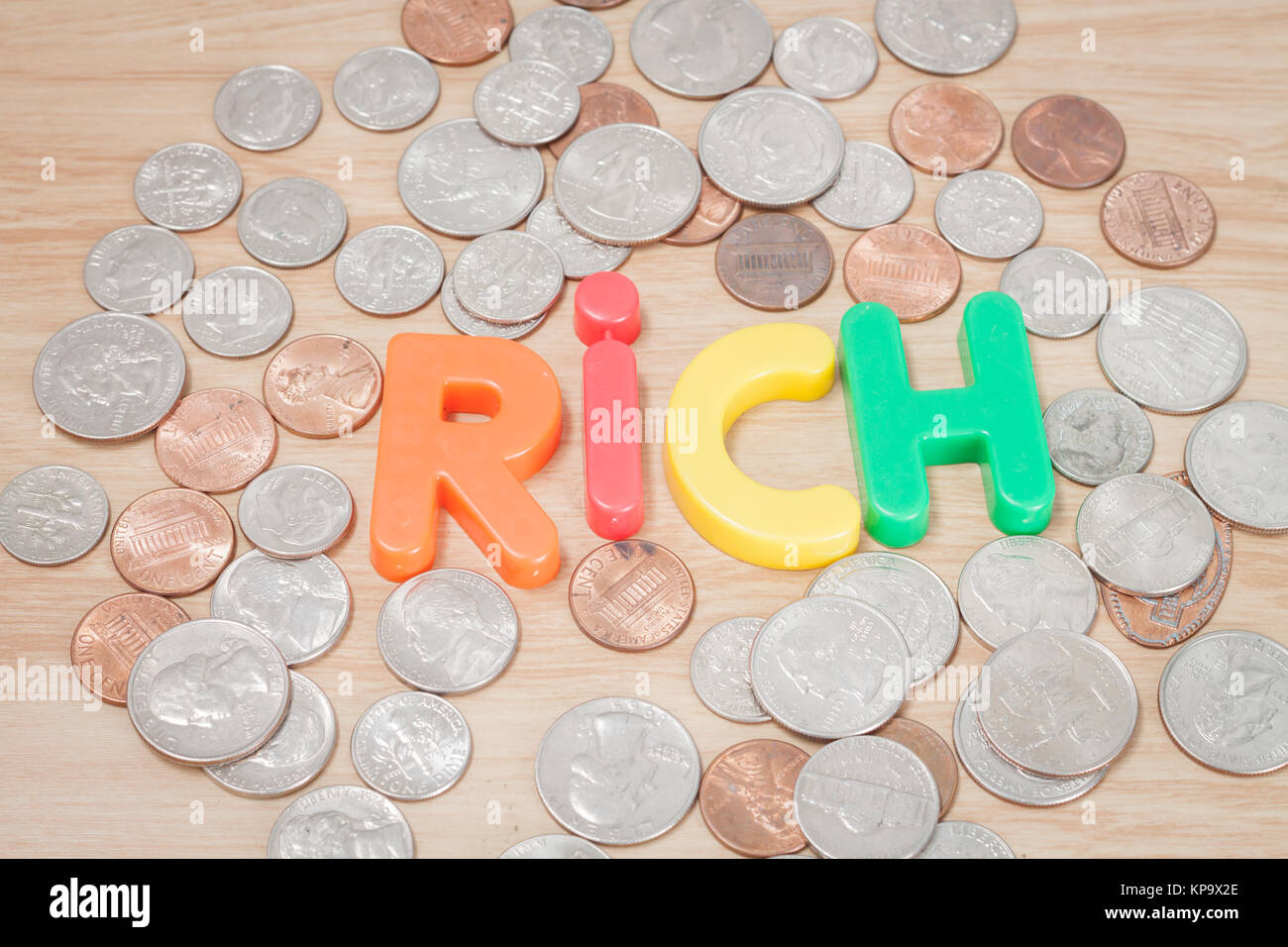 Rich alphabet with various US coins Stock Photo - Alamy