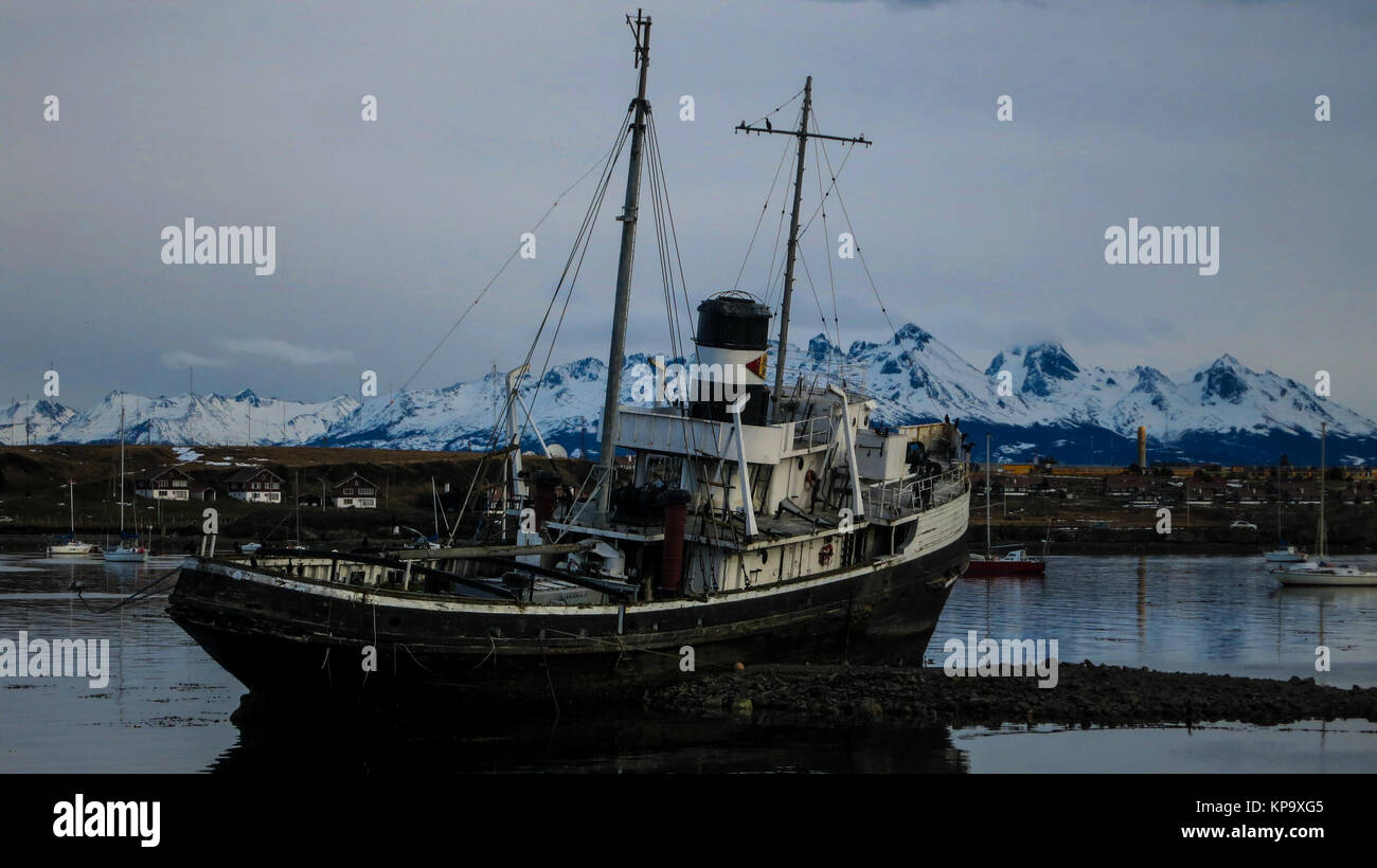A scuttled old ship in Ushuaia's harbor Stock Photo - Alamy