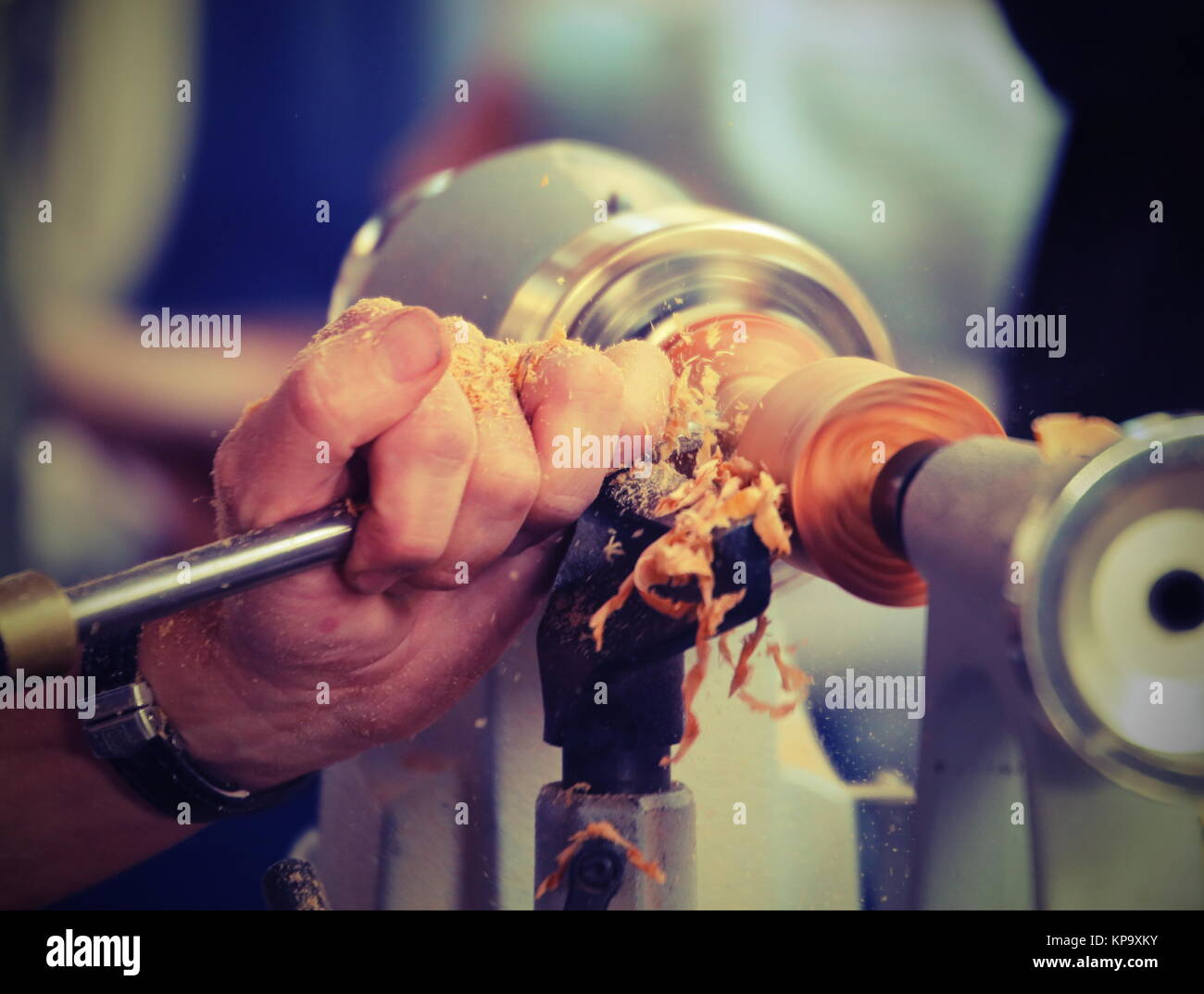 hand of a skilled artisan when working with the lathe of a piece of ...