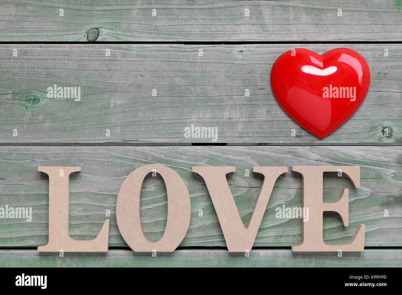 Word love made with wooden block wooden letters Stock Photo - Alamy