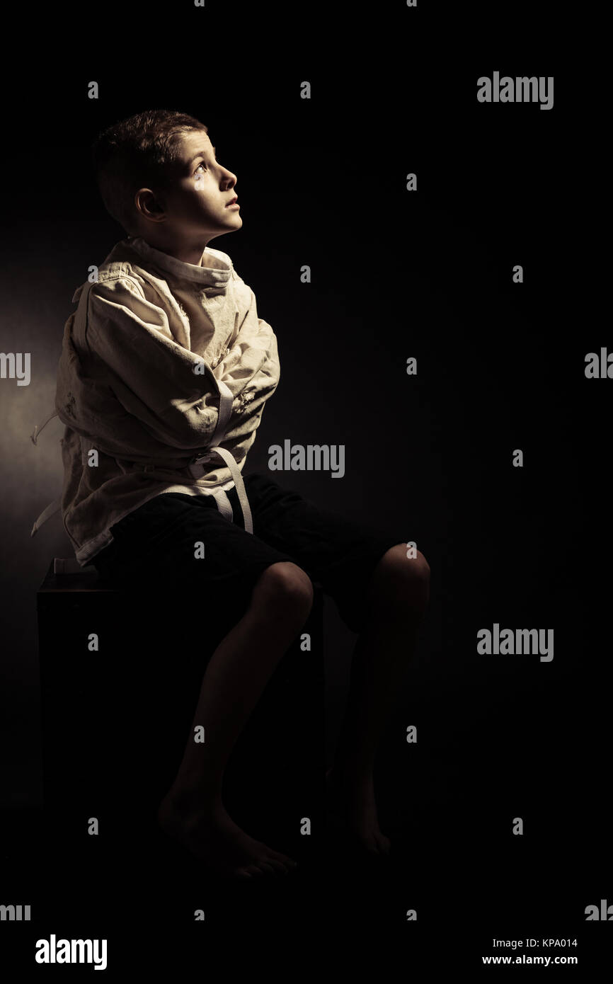 Isolated Lonely Young Boy Looking Up Seriously Stock Photo - Alamy