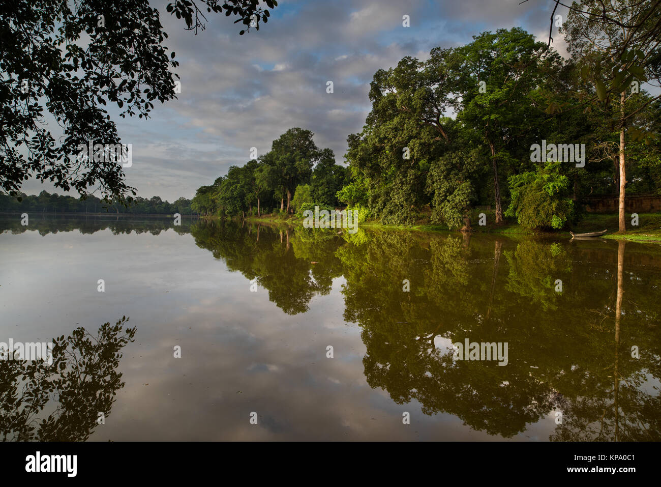 Forest lake, Angkor Wat in Cambodia is the largest religious monument ...