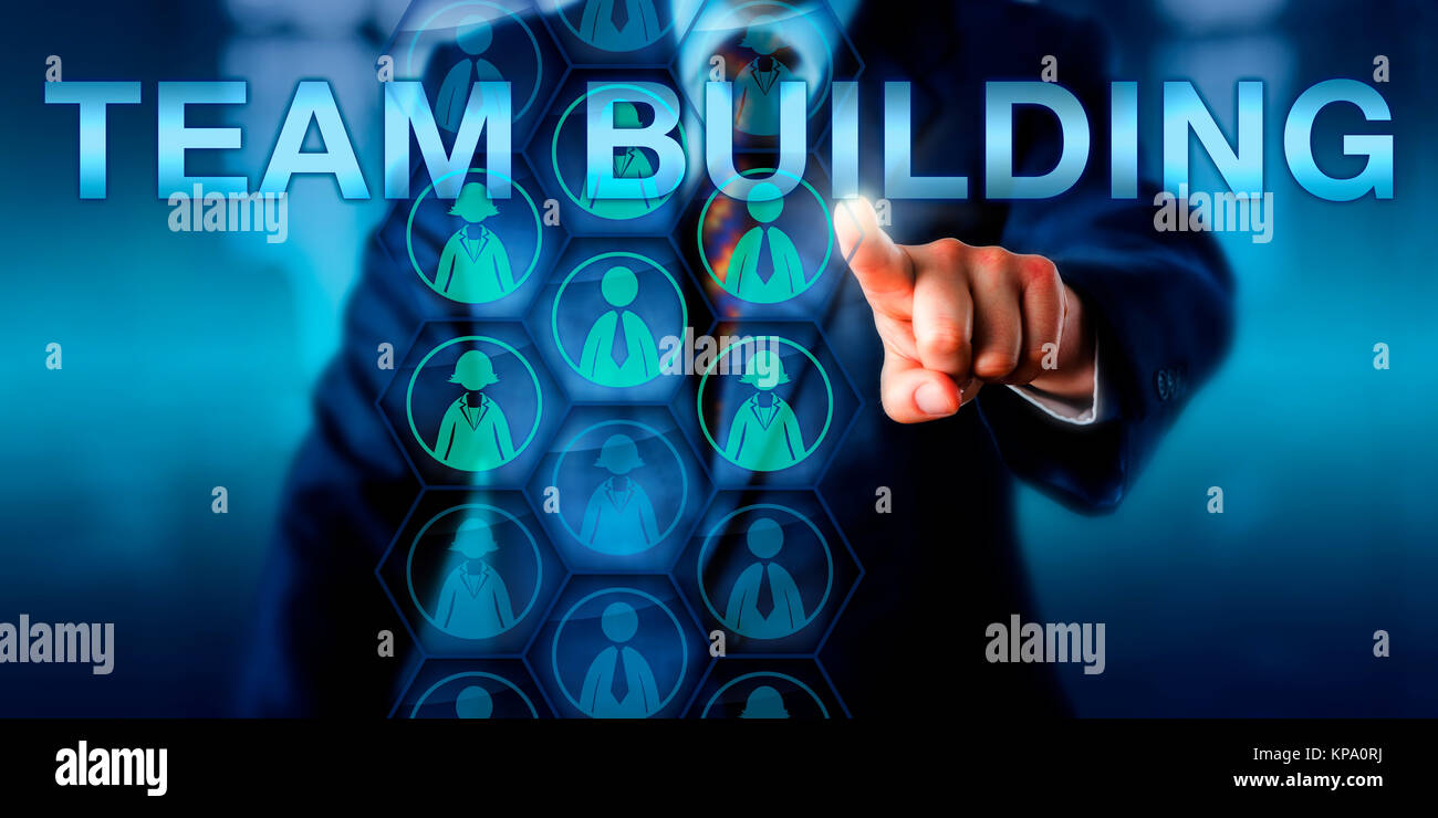 Manager Touching TEAM BUILDING Onscreen Stock Photo - Alamy