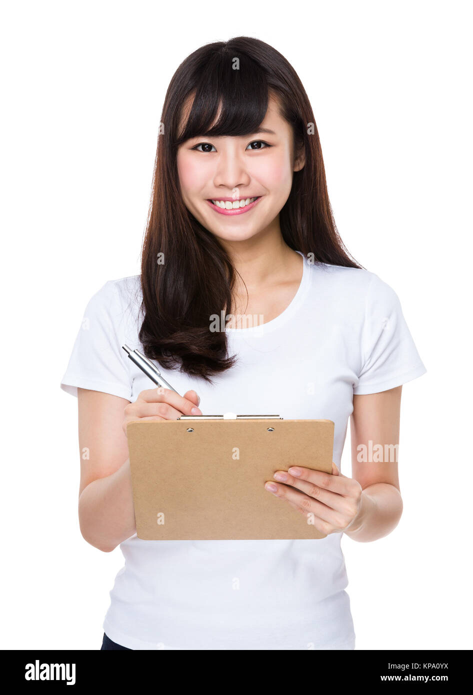 Asian woman take note on clipboard Stock Photo - Alamy