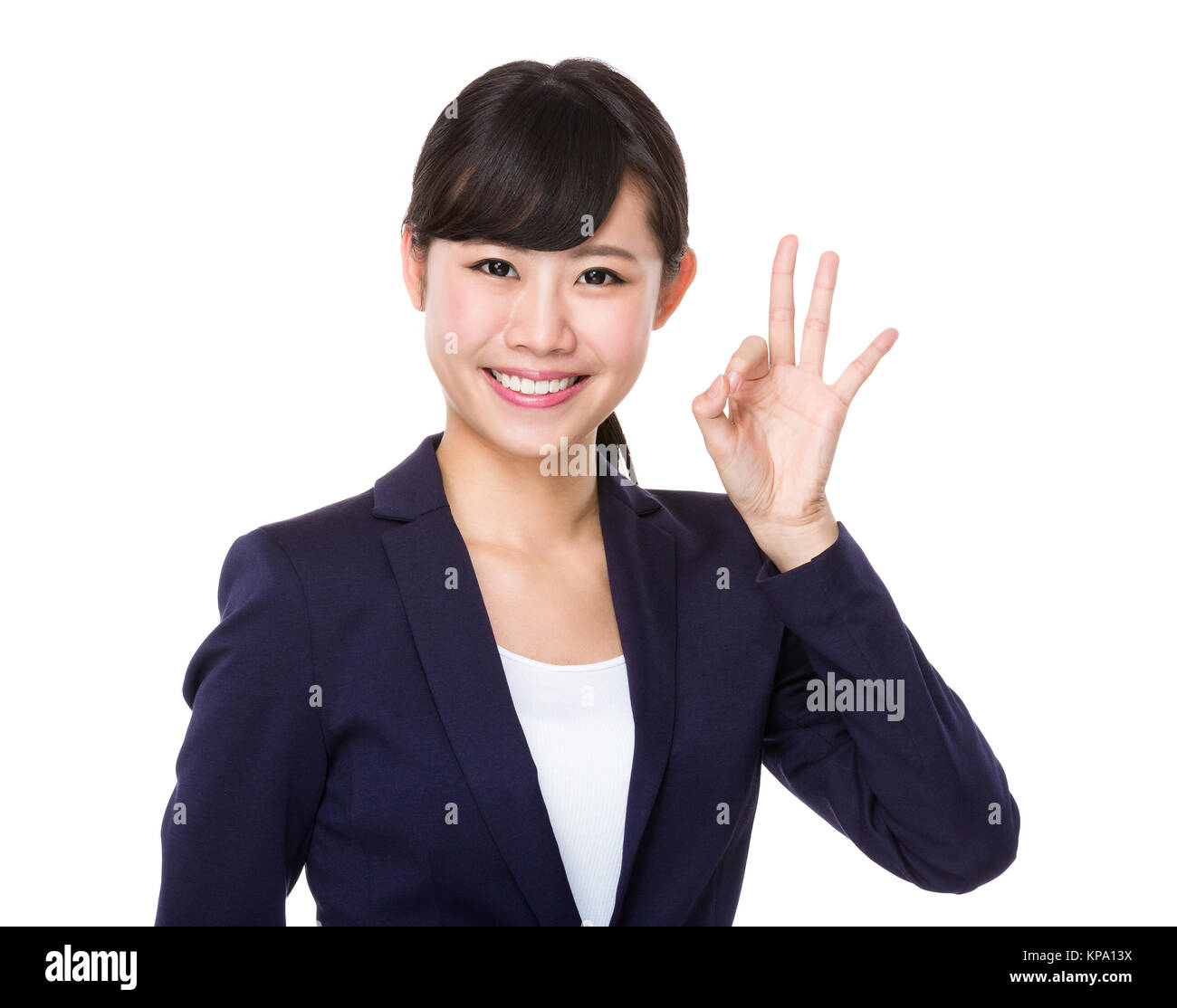 Businesswoman with ok sign gesture Stock Photo - Alamy
