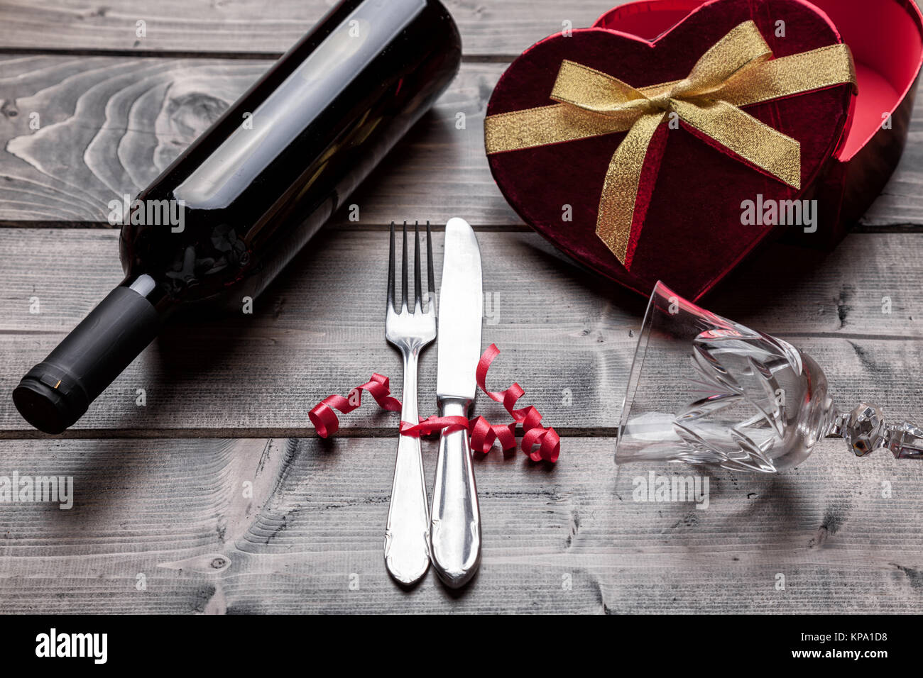 Romantic dinner set on wooden background Stock Photo - Alamy