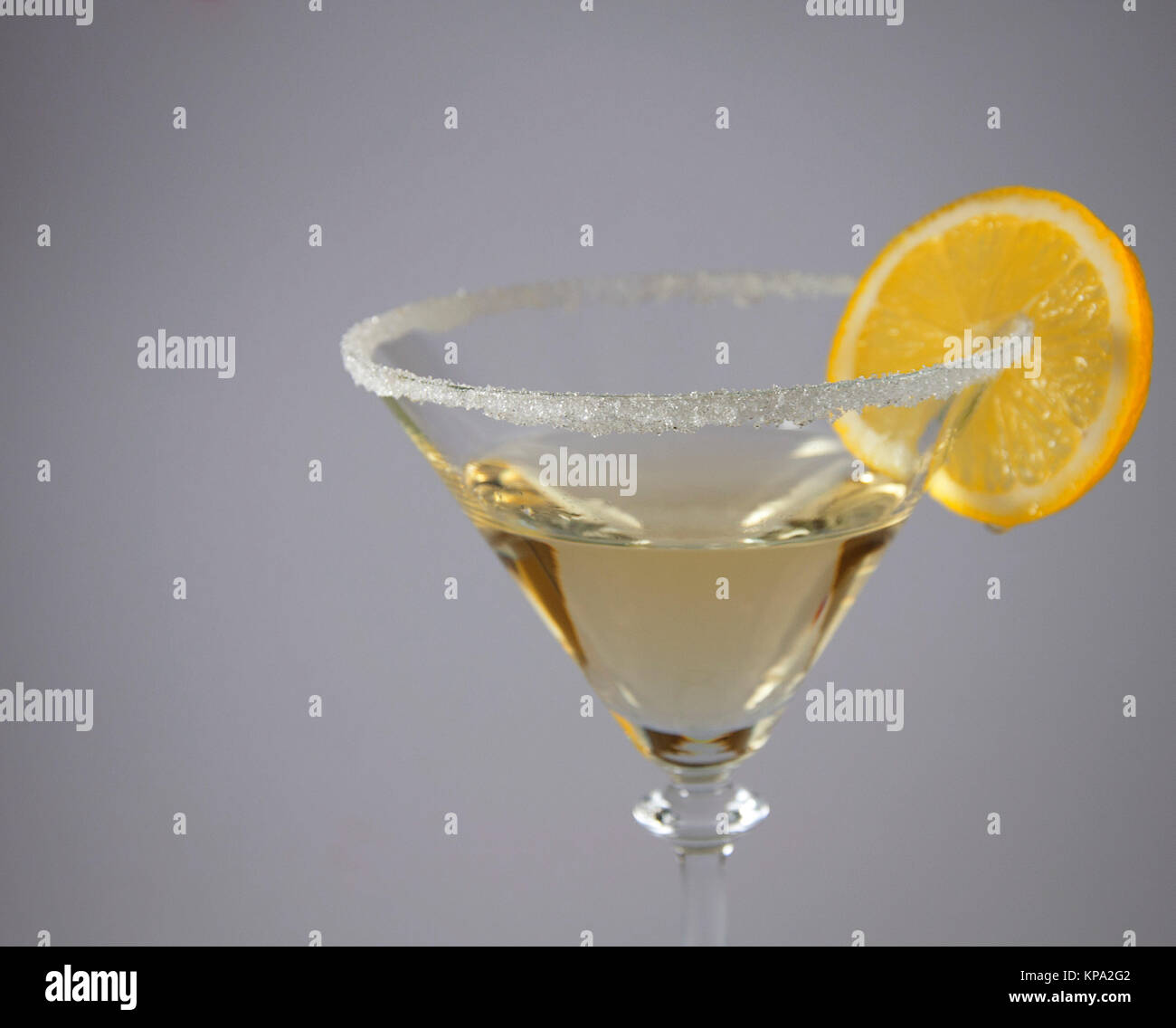 Cocktail In Martini Glass With Lemon Stock Photo - Alamy