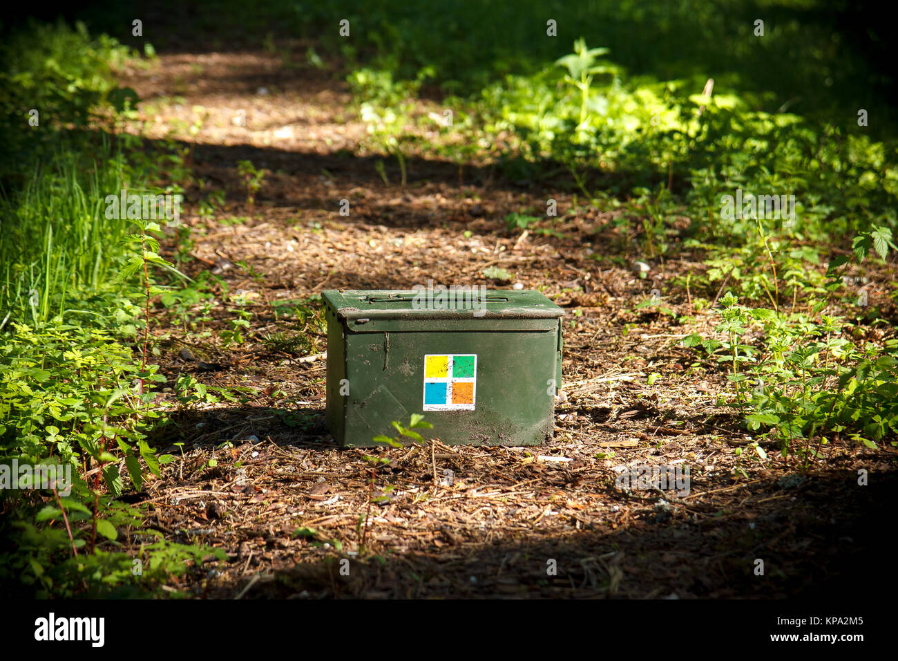 Green Geocaching container Stock Photo - Alamy