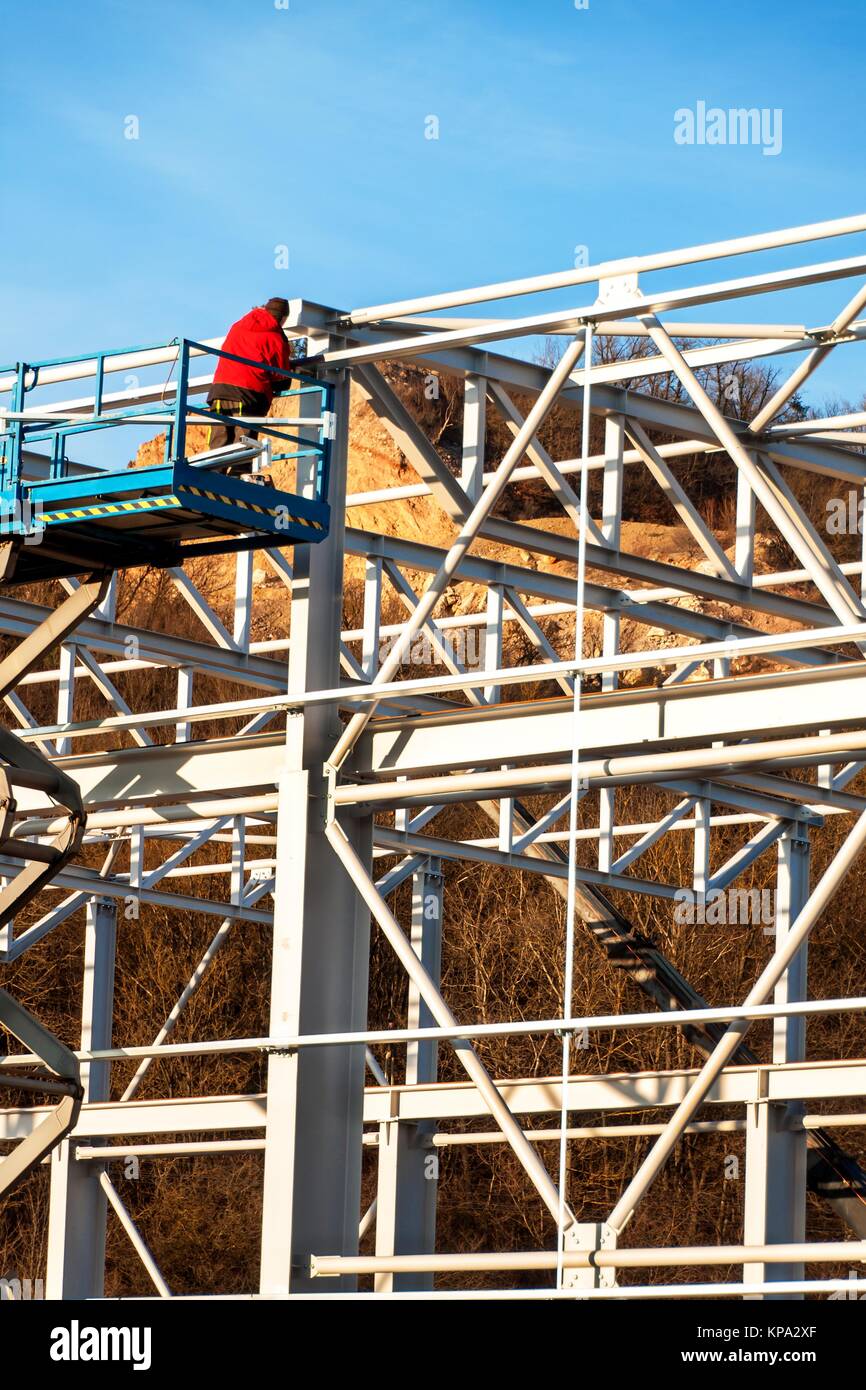 The steel structure is under construction. Installation of metal halls ...
