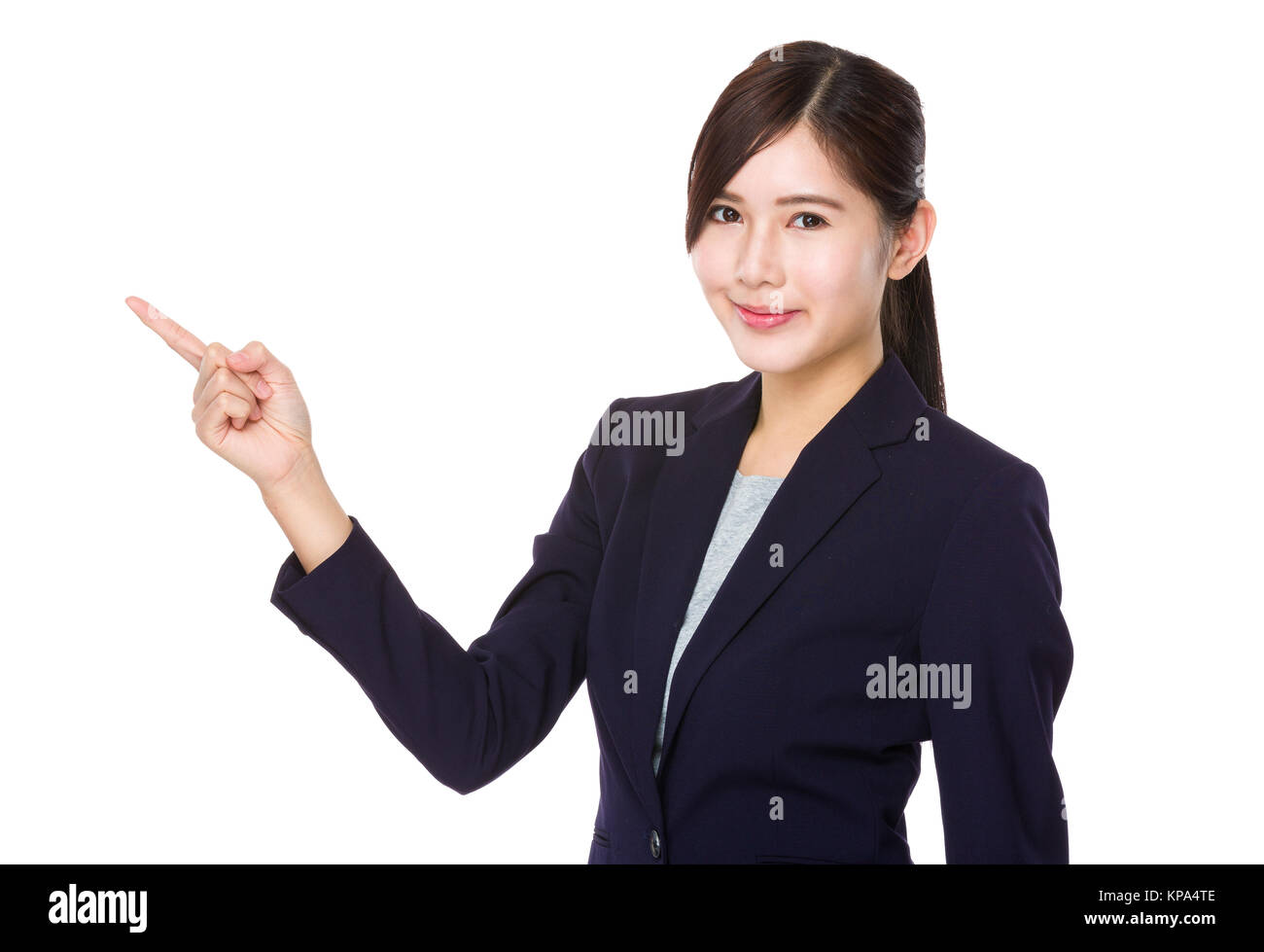 Young businesswoman with finger showing up Stock Photo - Alamy