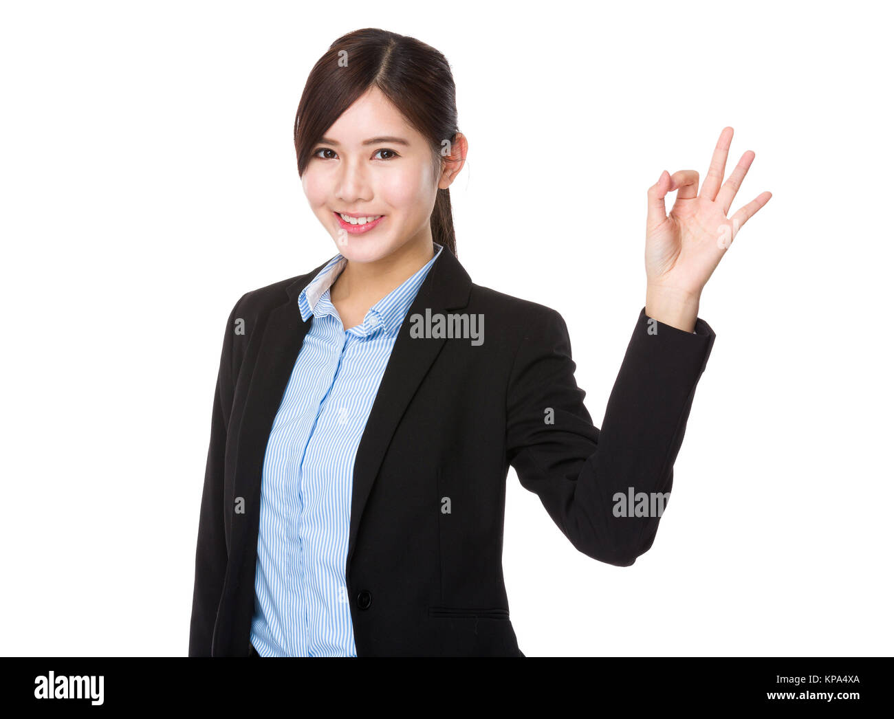 Asian young businesswoman with ok sign gesture Stock Photo - Alamy
