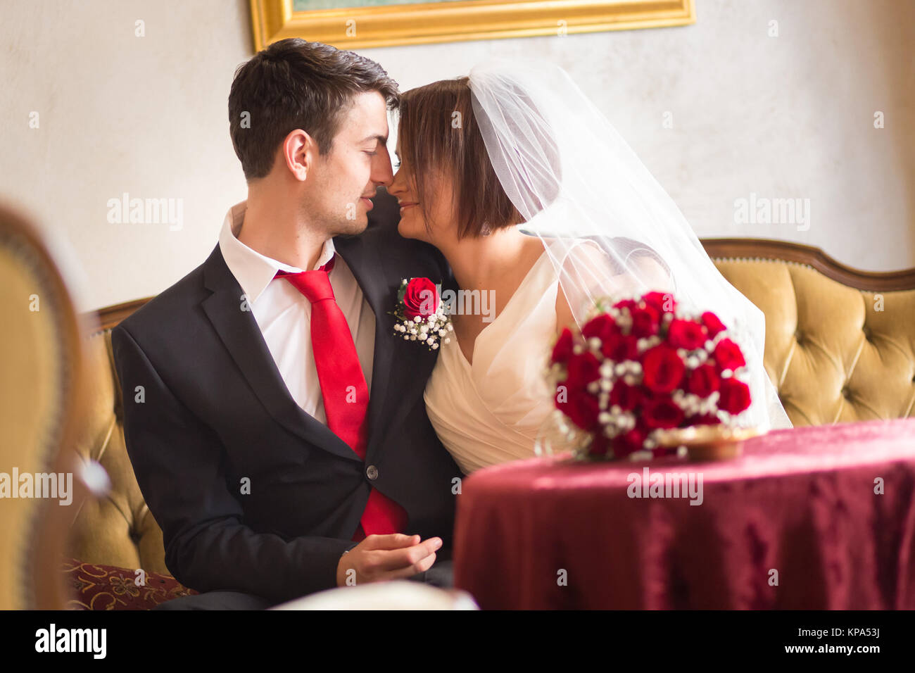 Beautiful wedding couple kissing Stock Photo - Alamy