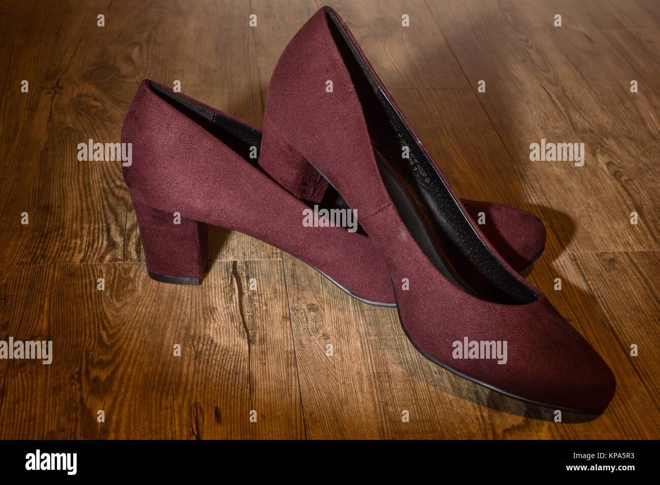 Dark red leather shoe hi-res stock photography and images - Alamy