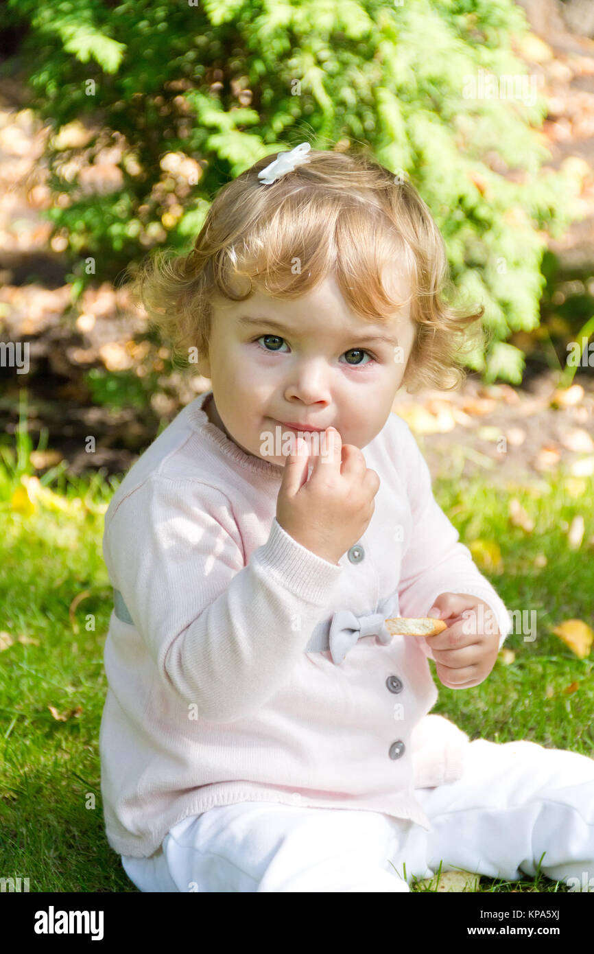 Cute thinking infant Stock Photo - Alamy