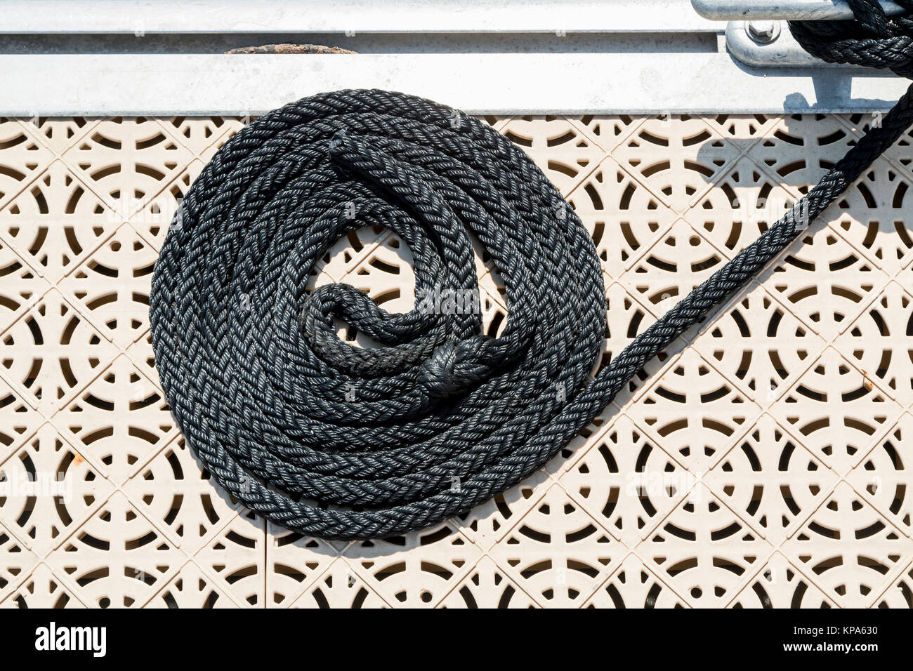 The braided mooring rope on a ship deck. Nautical mooring rope Stock ...