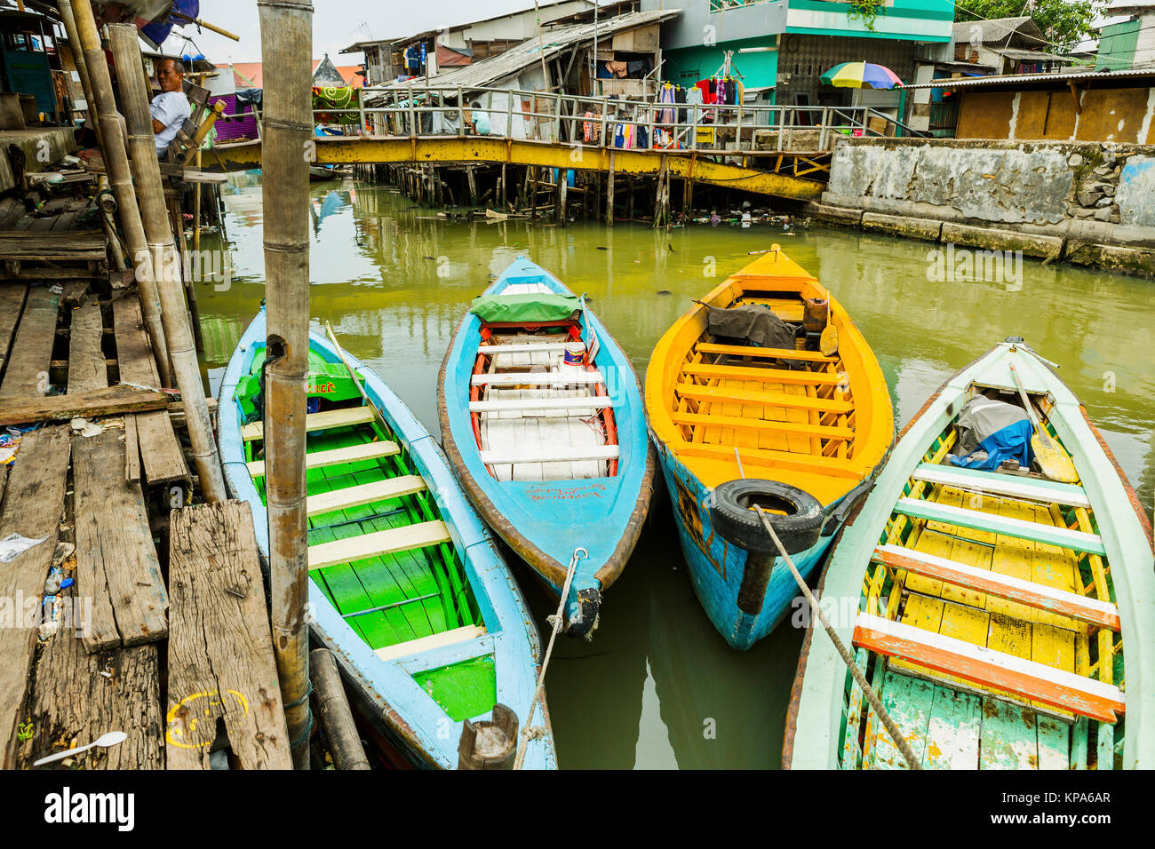 Sunda Kelapa old Harbour with fishing boats, ship and docks in Jakarta ...