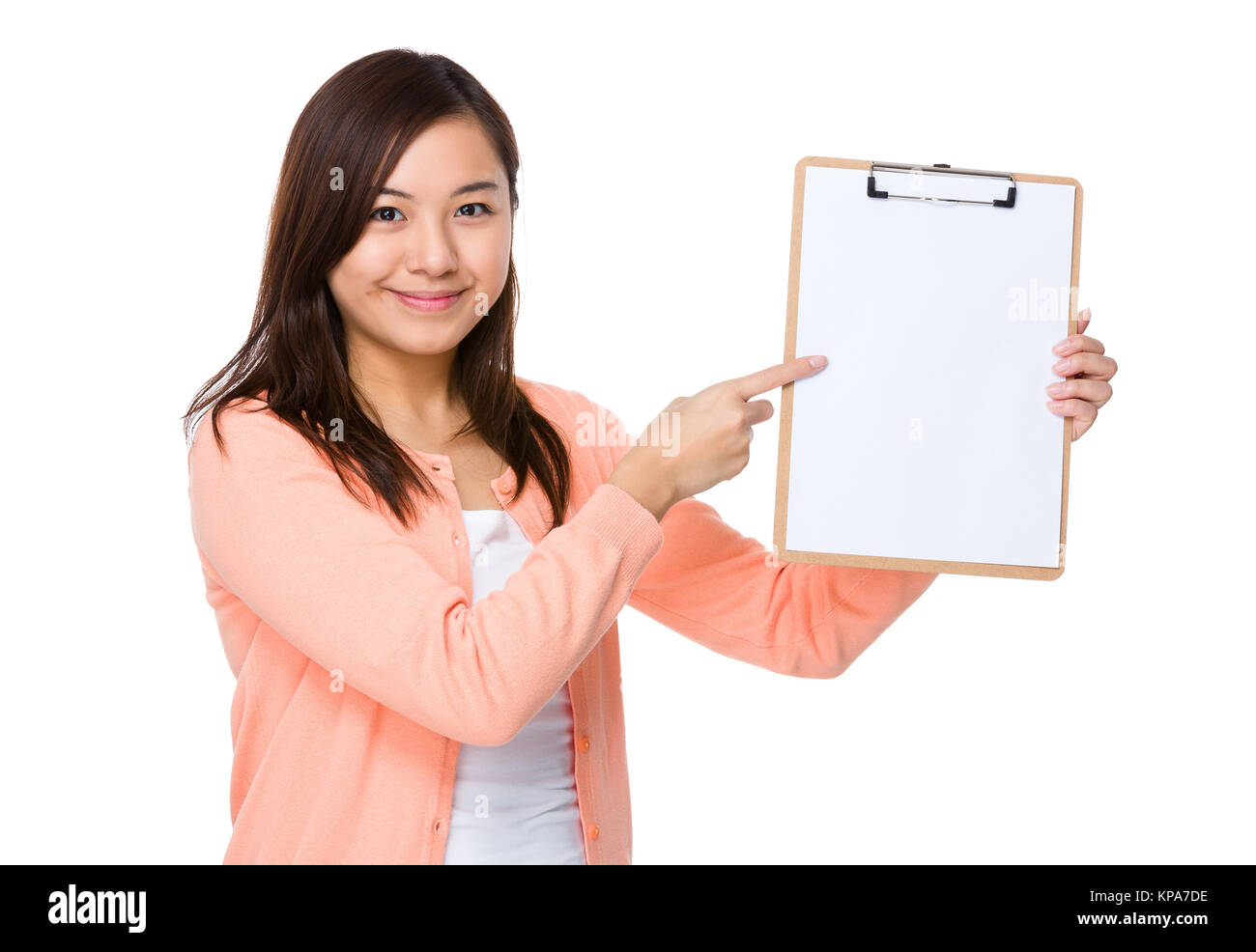 Woman with finger point to clipboard Stock Photo - Alamy