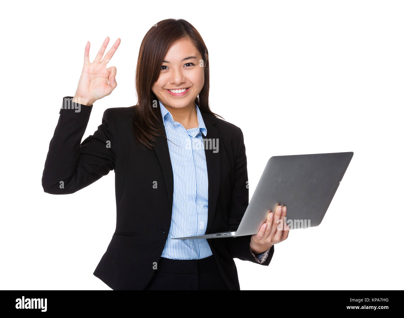 Asian businesswoman hold with laptop computer and ok sign gesture Stock Photo - Alamy