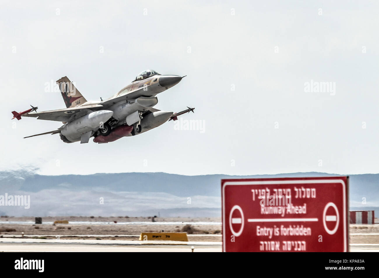 Israeli Air Force (IAF) General Dynamics F-16D in flight with a blue ...