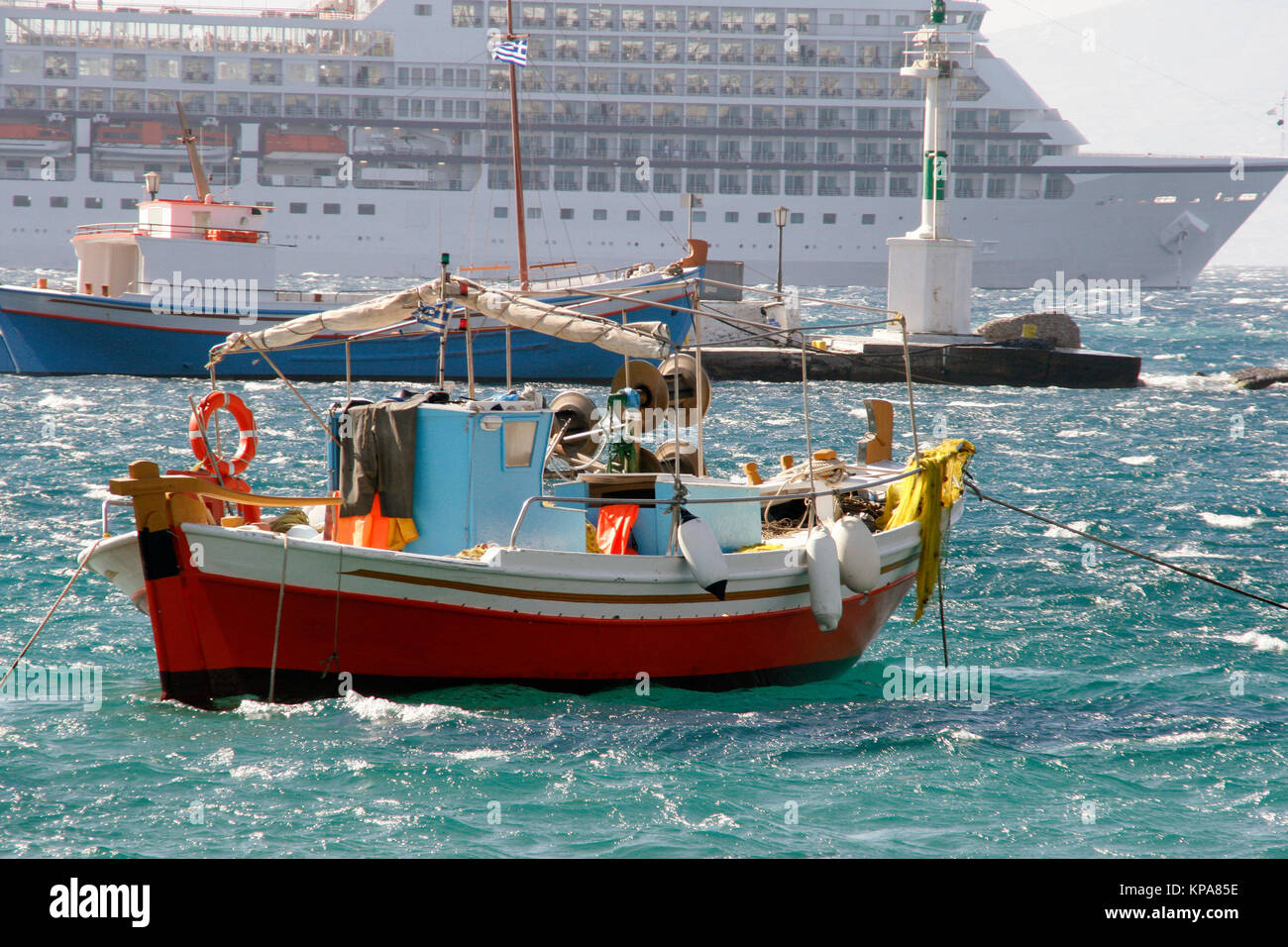 professional fisherboat many seagulls come back in the harbor Stock Photo - Alamy