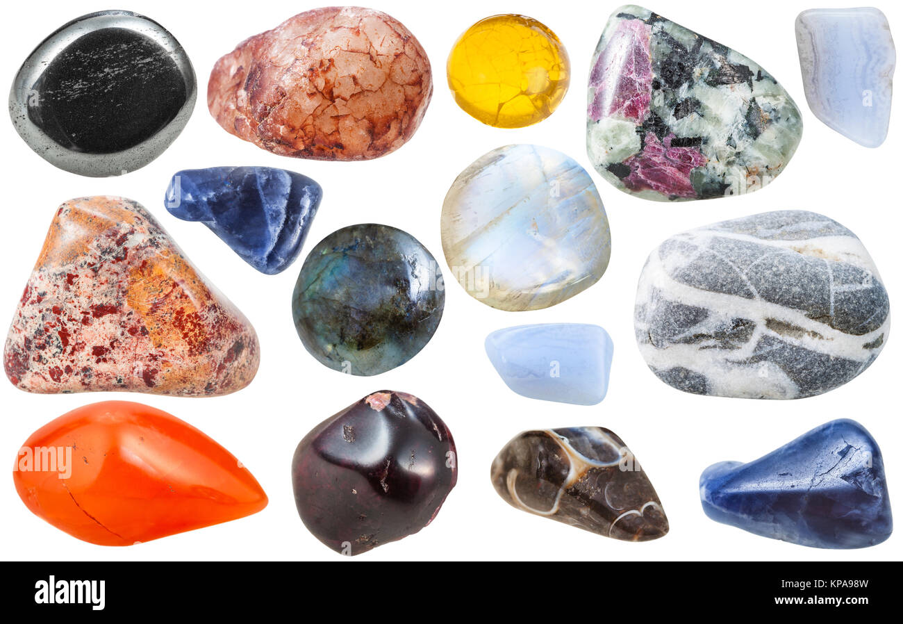 many tumbled ornamental gem stones isolated Stock Photo - Alamy